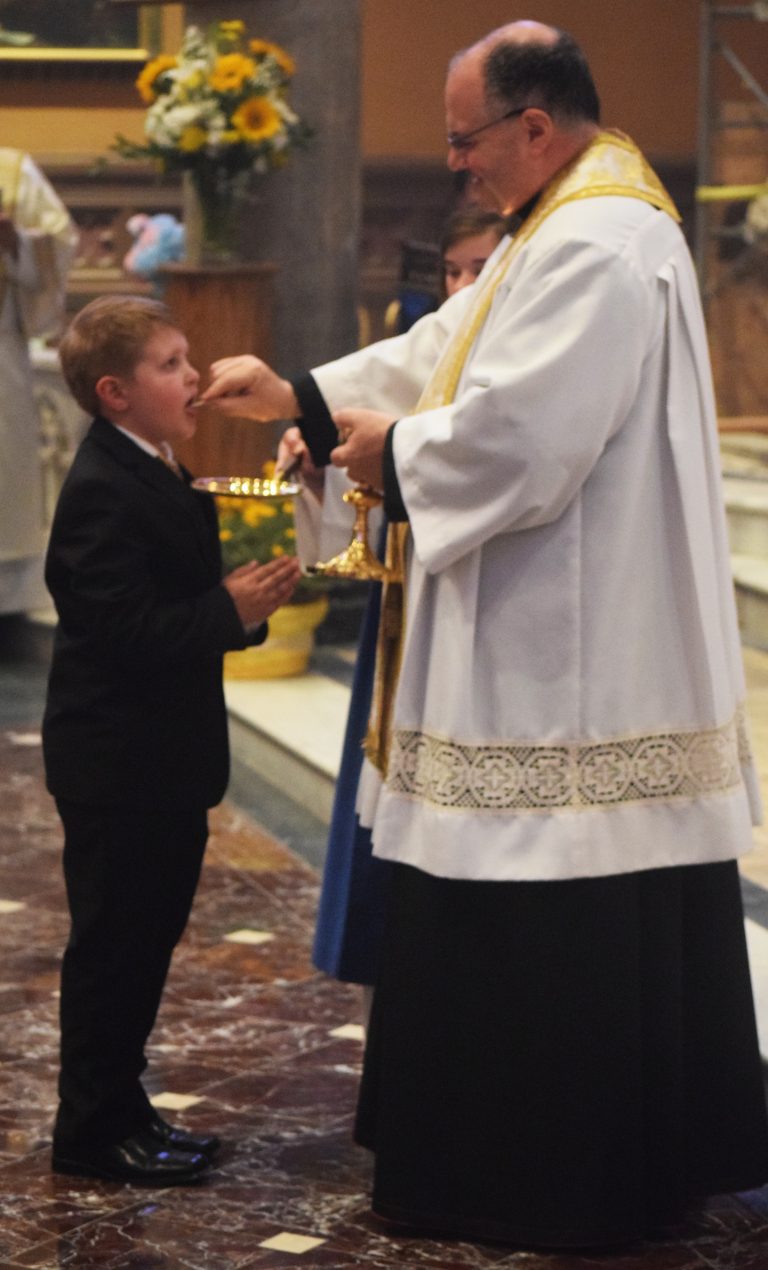The Catholic Post First Communicants told sacrament brings Jesus even ...