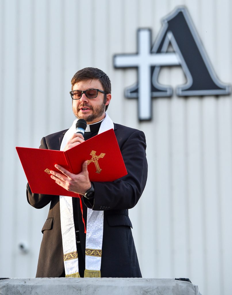 The Catholic Post Alleman community gathers in school parking lot to ...