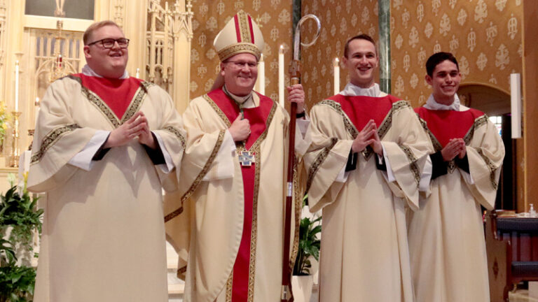 The Catholic Post Solemnity, smiles as three ordained transitional ...