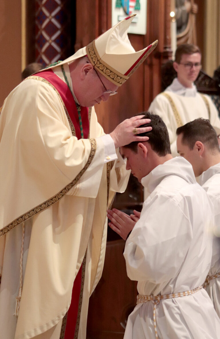 The Catholic Post Solemnity, smiles as three ordained transitional ...
