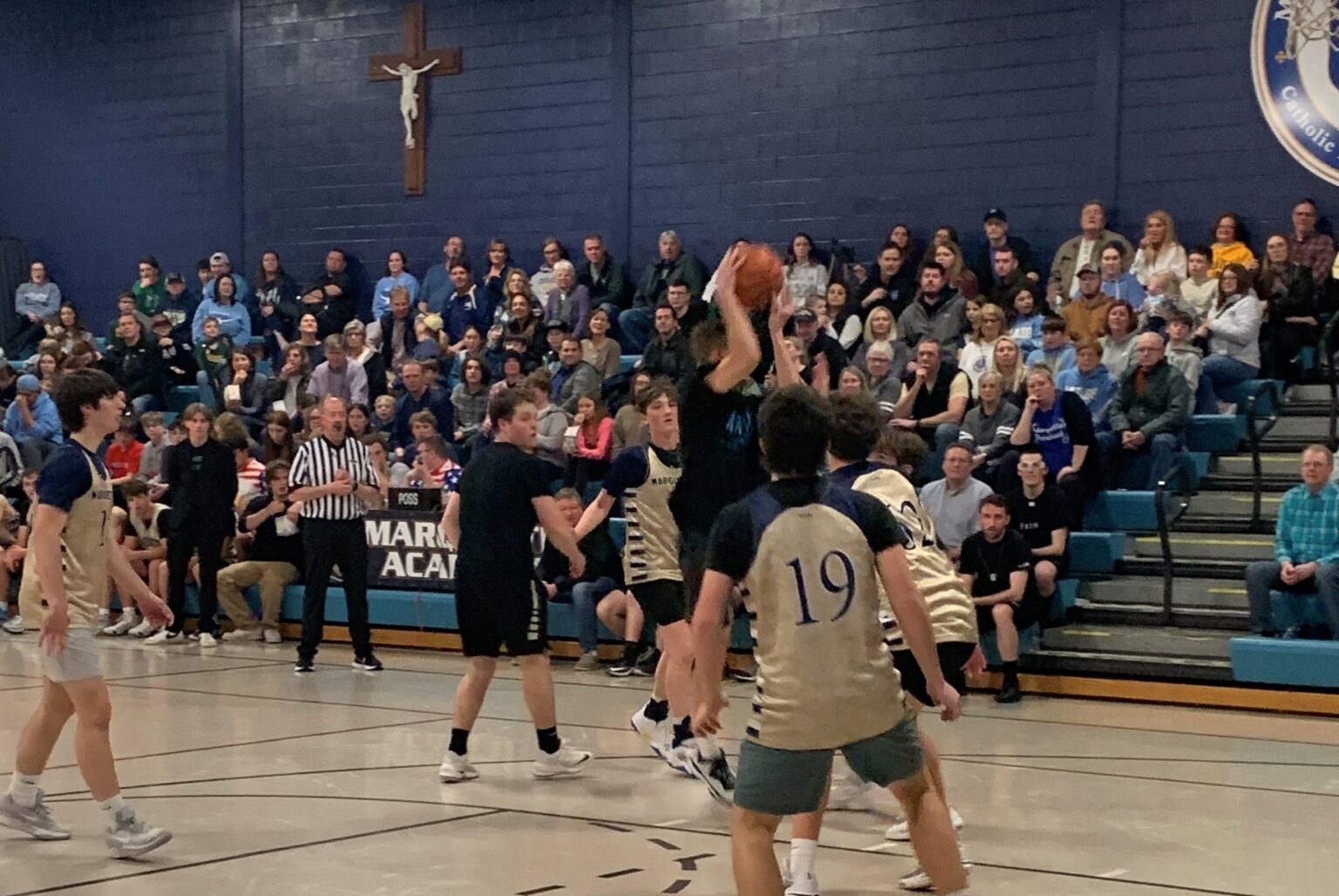 The Catholic Post Faith/fans win as priests play Marquette high school ...